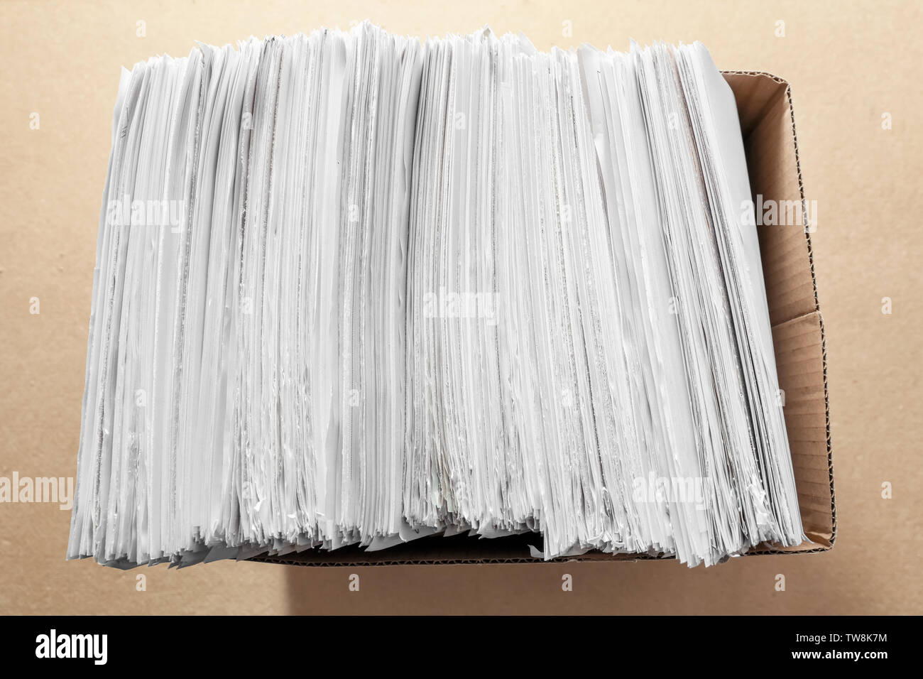 Cardboard box with old documents on table in archive Stock Photo - Alamy