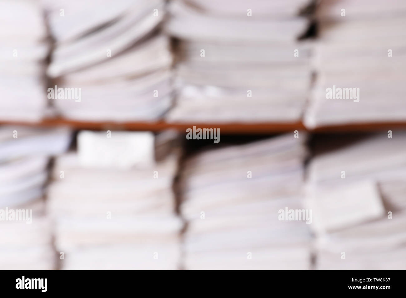 Blurred view of paper documents in archive Stock Photo - Alamy