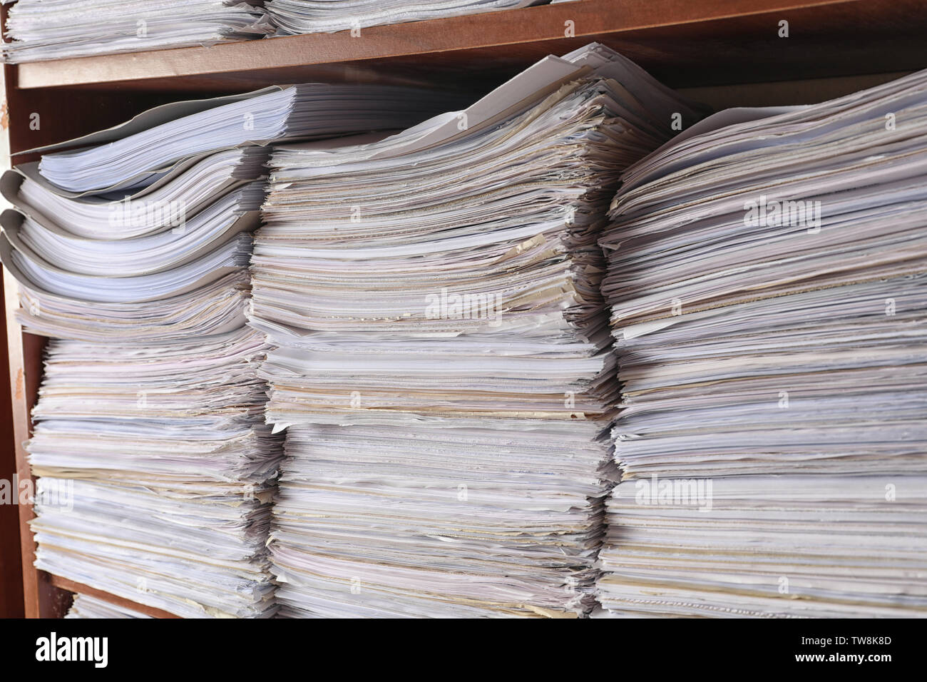 Stacks of old folders with documents in archive Stock Photo - Alamy