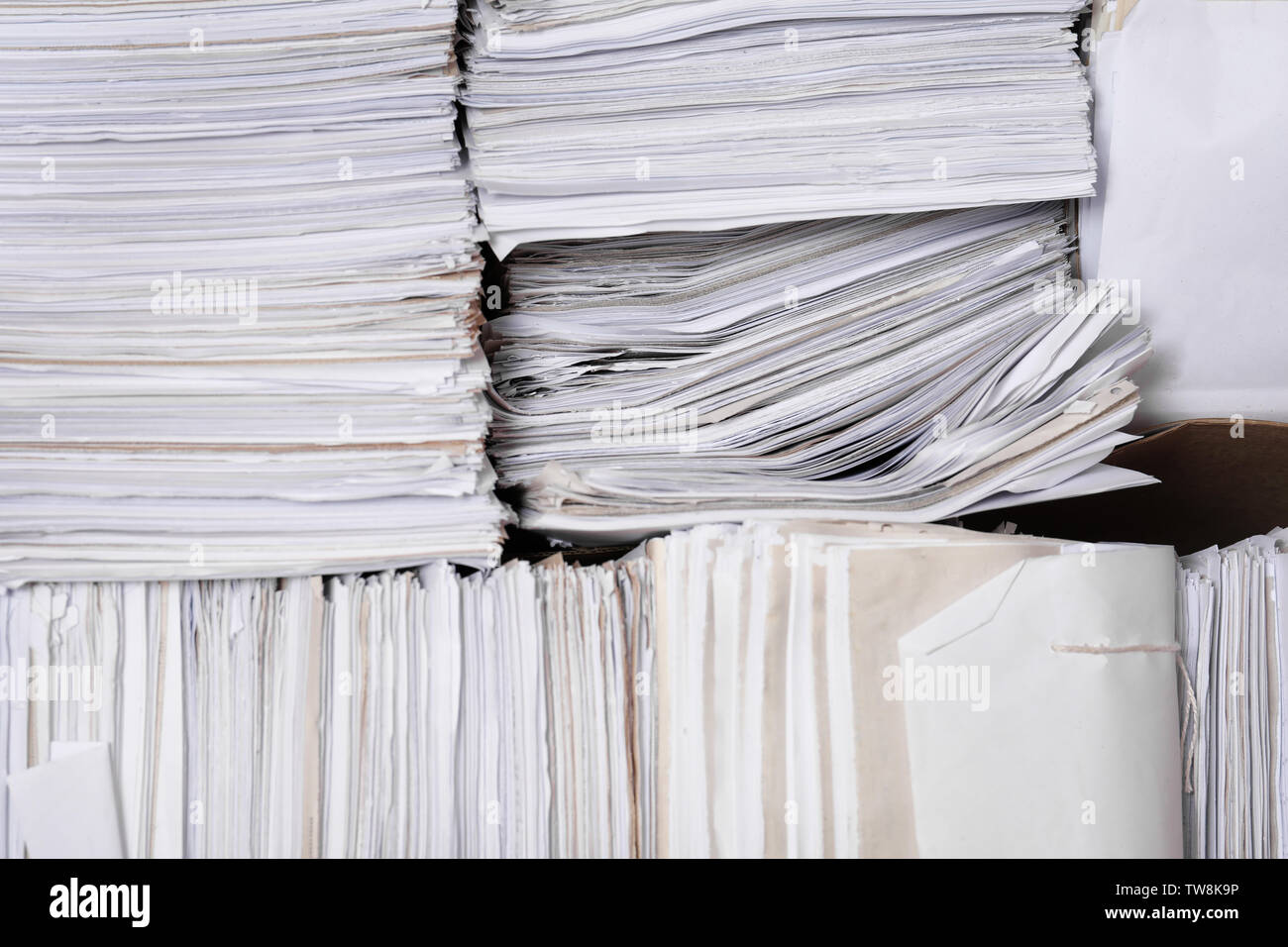 Stacks of old paper documents in archive Stock Photo - Alamy