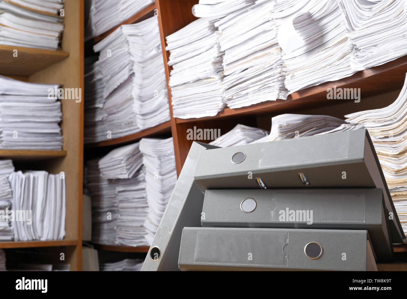 Folders and shelves with old paper documents in archive Stock Photo - Alamy