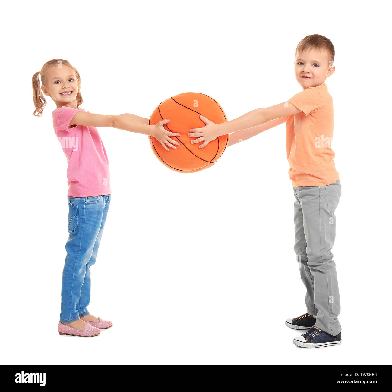 Cute little children playing with ball on white background Stock Photo ...
