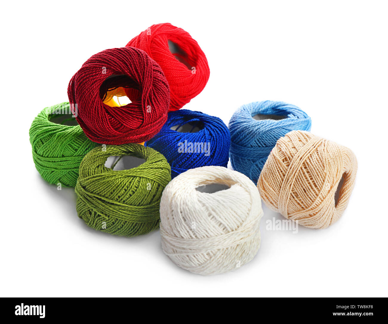 Colorful threads on white background Stock Photo - Alamy