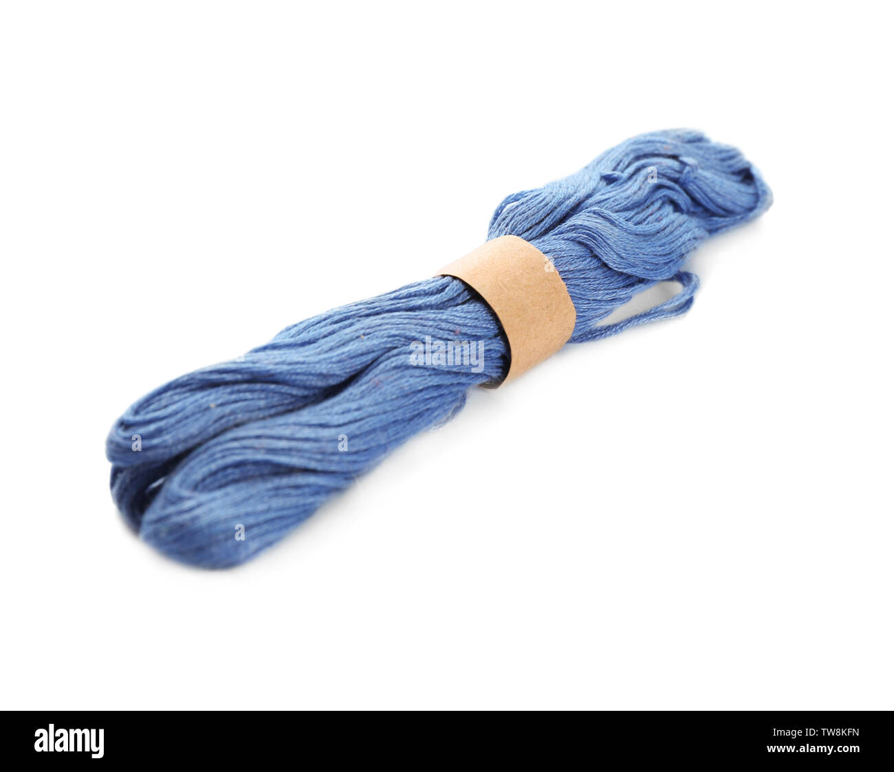 Blue embroidery thread on white background Stock Photo - Alamy