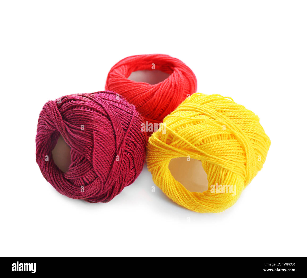 Colorful threads on white background Stock Photo - Alamy