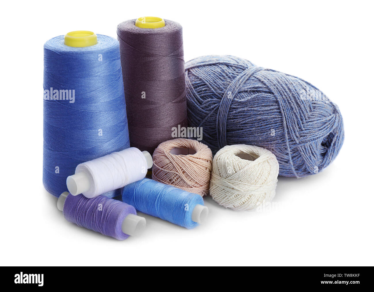 Blue threads of different shades on white background Stock Photo - Alamy