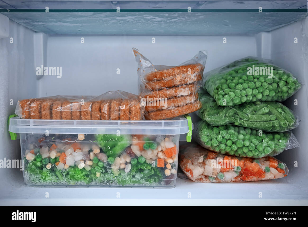 Freezer with different products, closeup Stock Photo - Alamy
