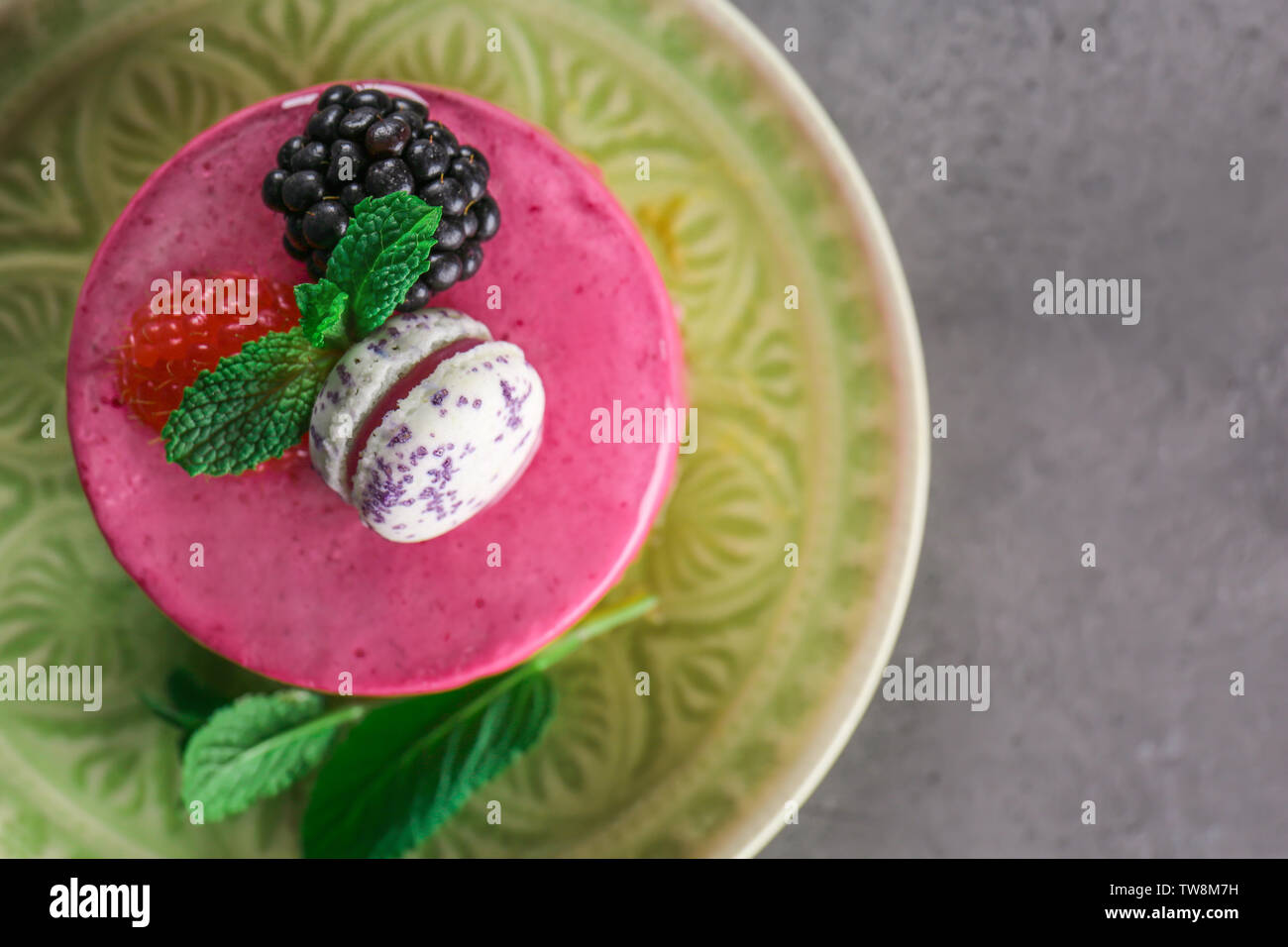 Tasty berry mousse cake on plate Stock Photo - Alamy