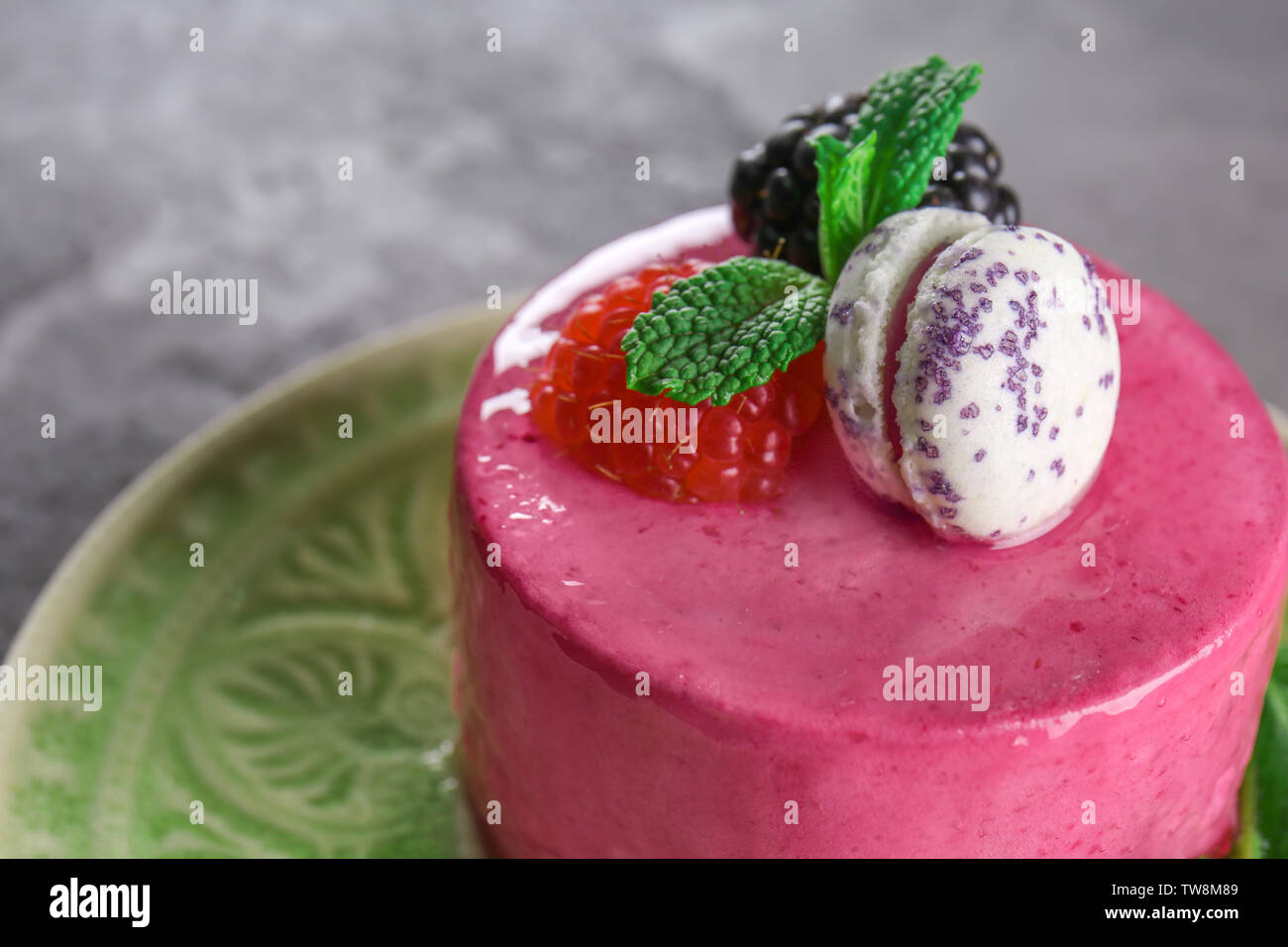 Tasty berry mousse cake on plate, closeup Stock Photo - Alamy