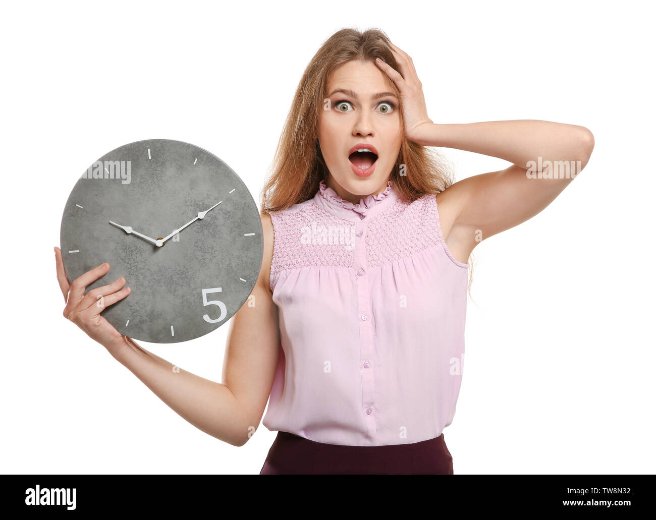 Shocked manager with clock on white background Stock Photo - Alamy