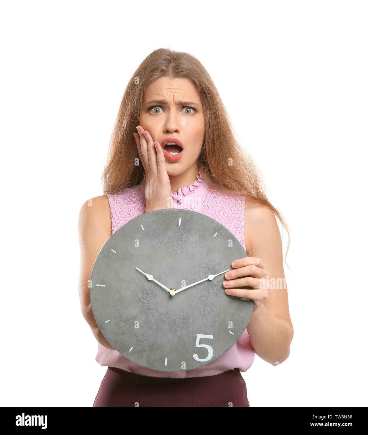 Shocked manager with clock on white background Stock Photo - Alamy