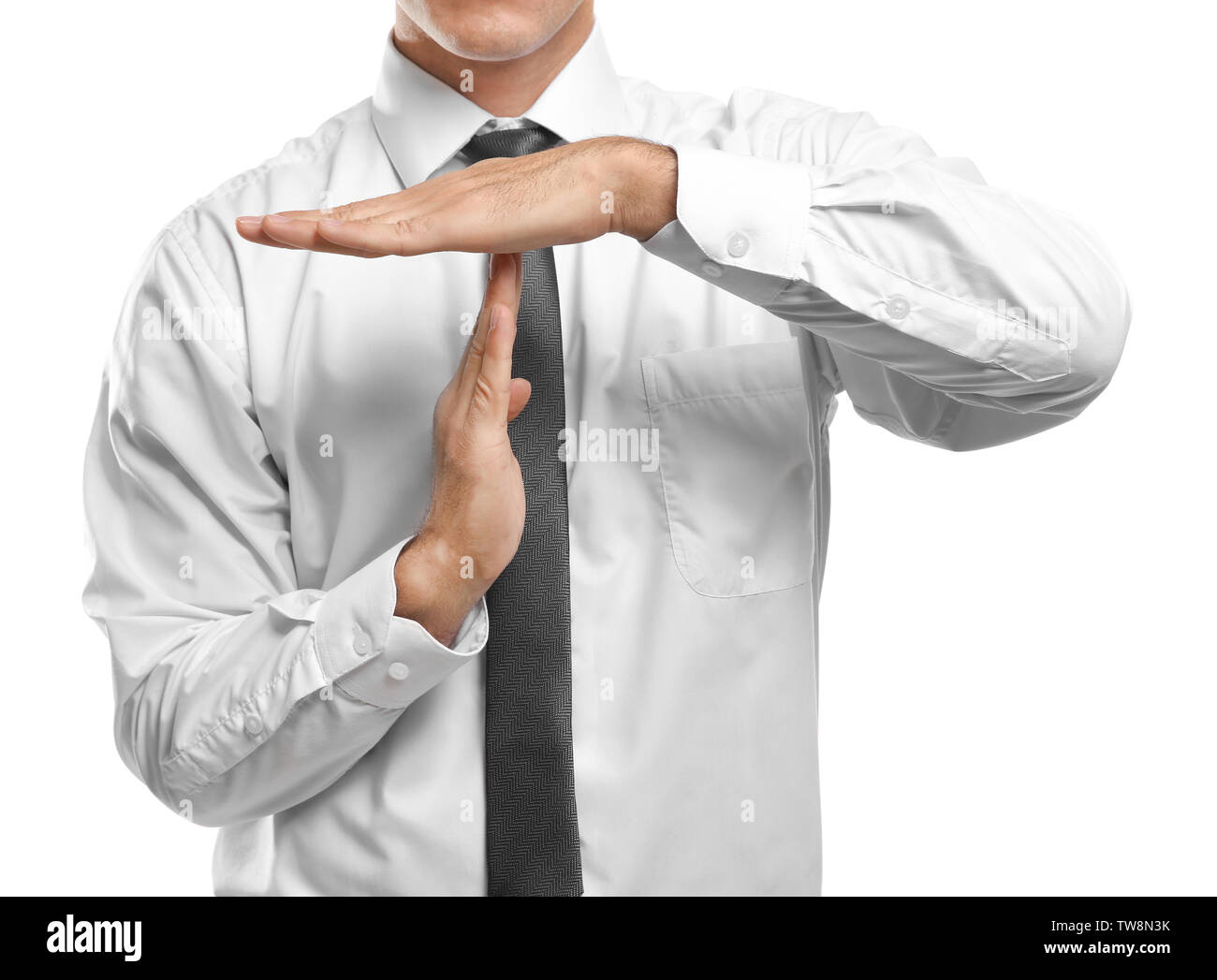 Manager showing time out gesture on white background Stock Photo - Alamy