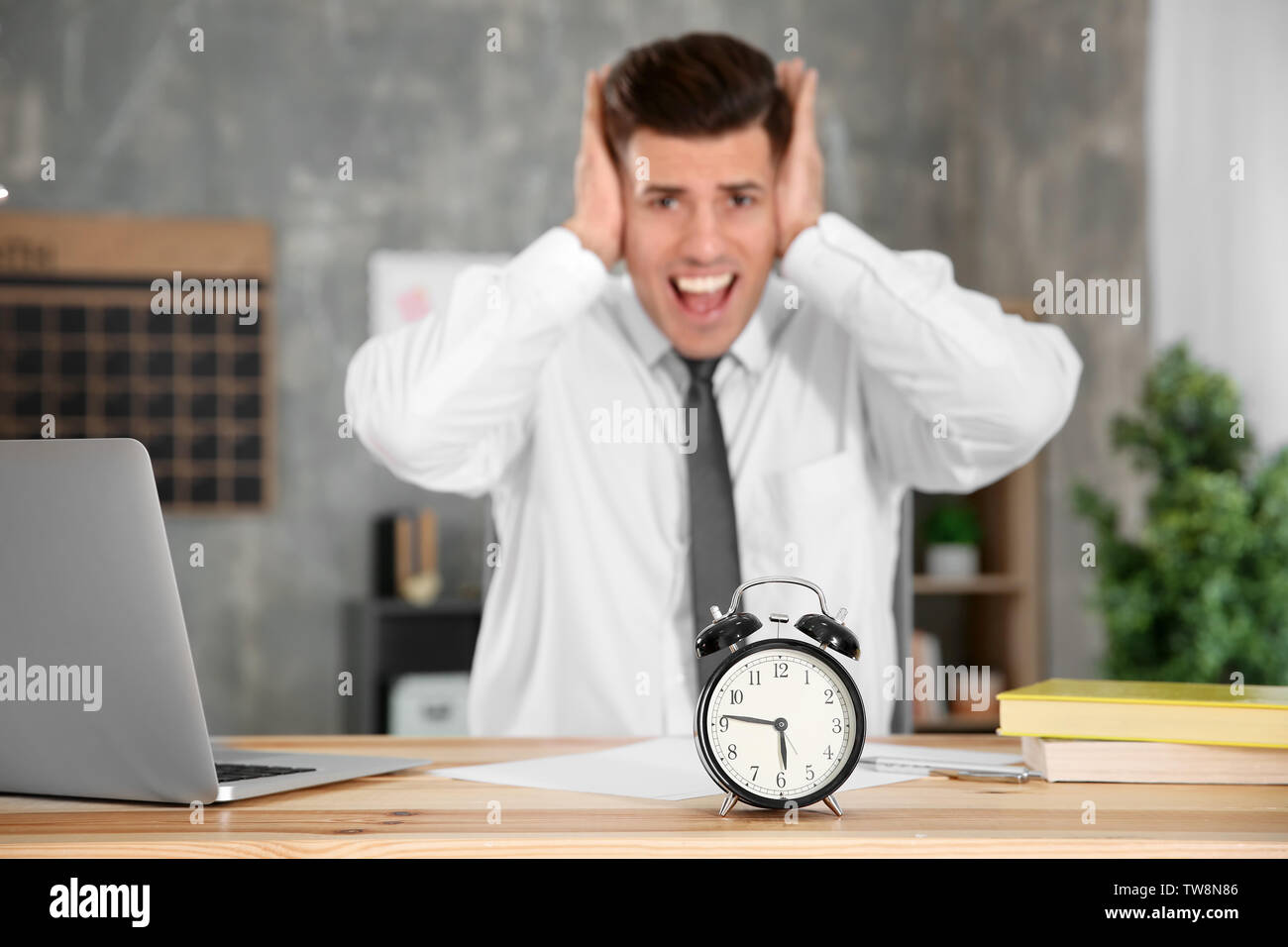 Alarm clock and screaming manager in office. Time management concept ...