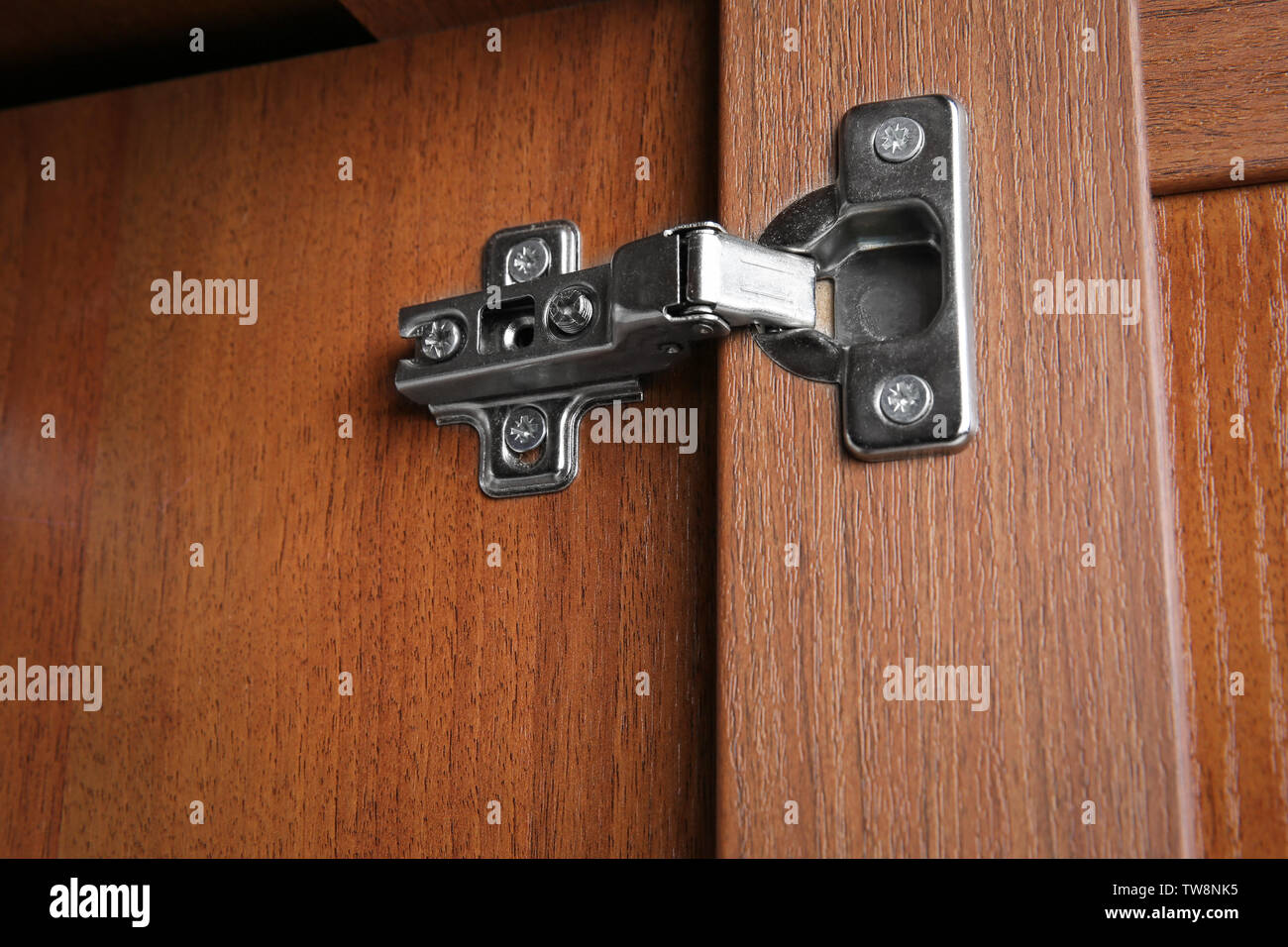 Metal hinges wardrobe cabinet hi-res stock photography and images - Alamy