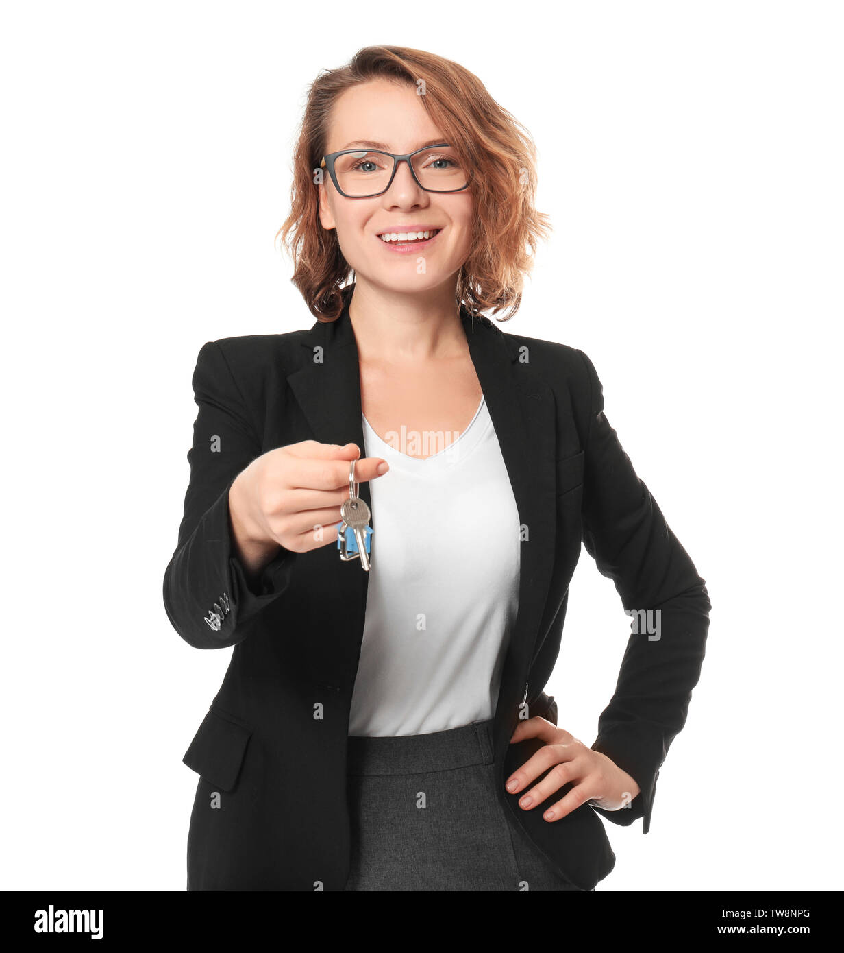 Beautiful real estate agent with key on white background Stock Photo ...