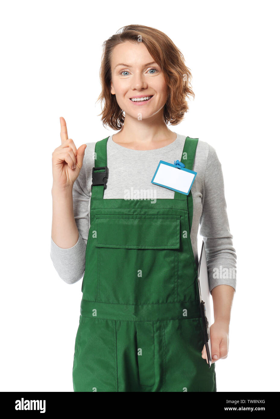 Female auto mechanic with raised index finger on white background Stock ...
