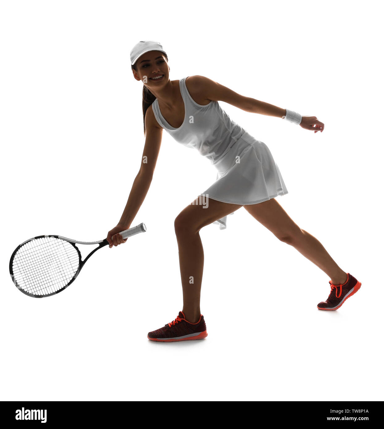Young woman with tennis racket on white background Stock Photo - Alamy