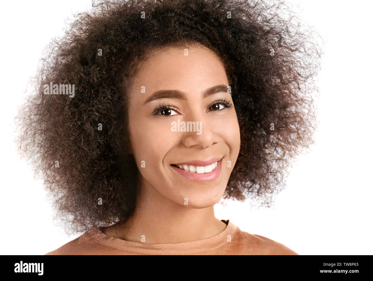 Attractive African American Woman Posing On Light Background Stock