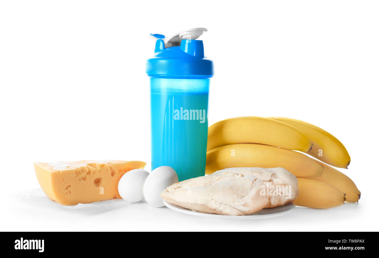 Protein shake in bottle and products on white background Stock Photo ...