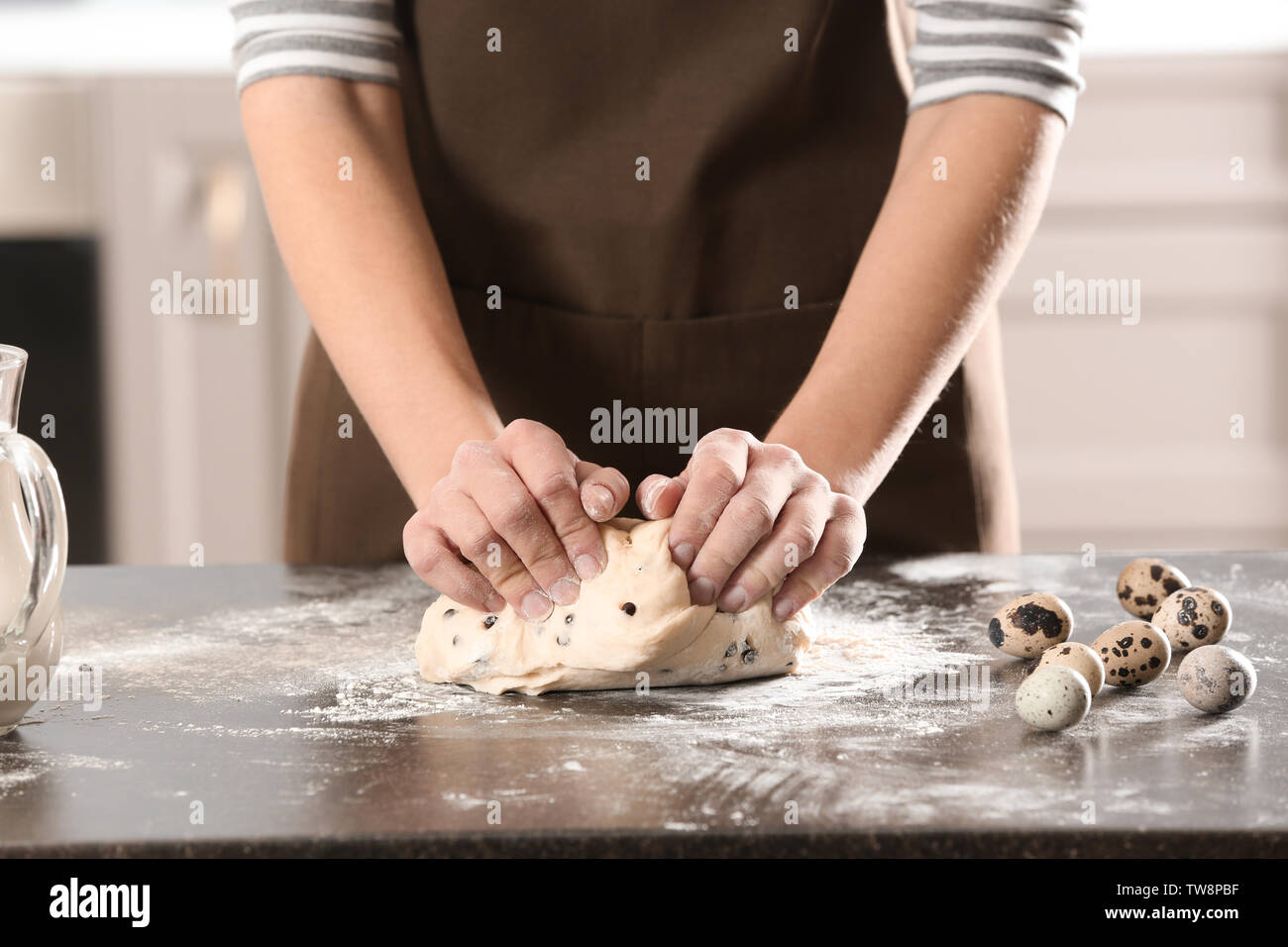 Woman kneading chocolate dough cake hi-res stock photography and images ...