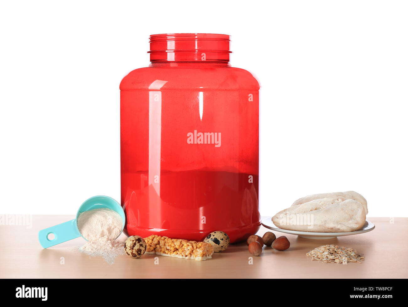 Protein powder and products on table against white background Stock ...