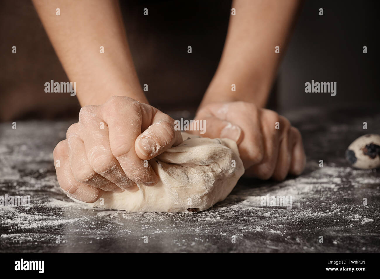 Woman hands kneading chocolate dough hi-res stock photography and ...