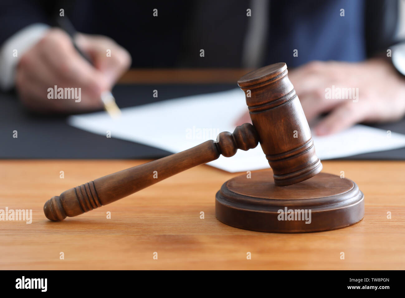 Judge hammer on table in notary's office Stock Photo - Alamy