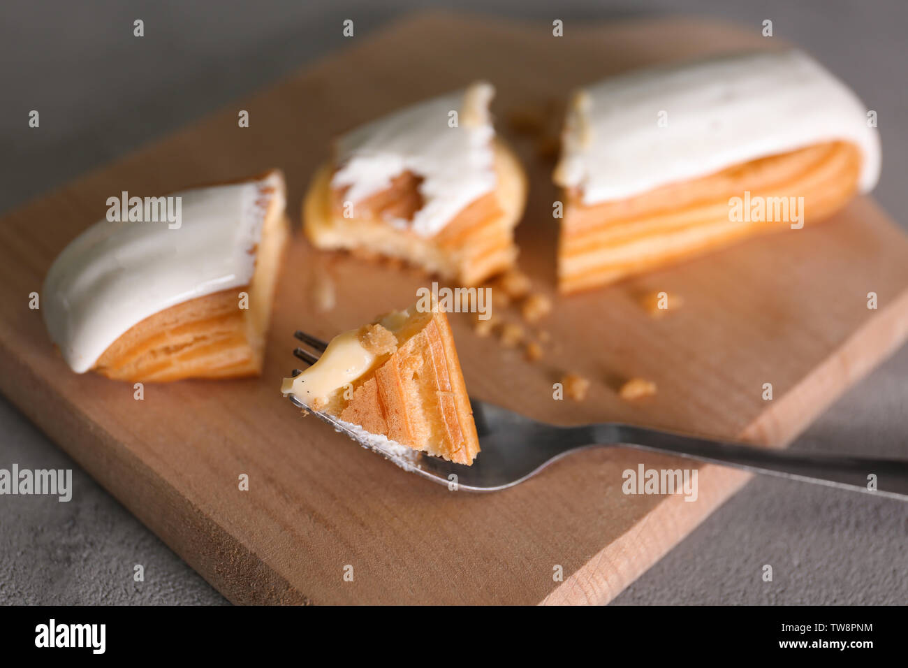 Cut the eclair hi-res stock photography and images - Alamy