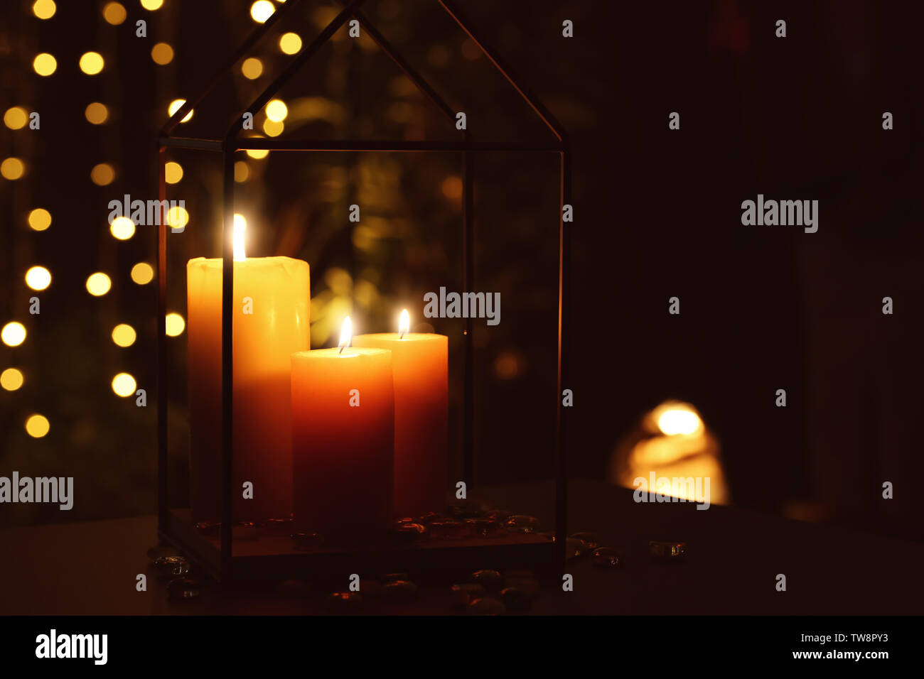 Beautiful candles burning against dark hi-res stock photography and ...