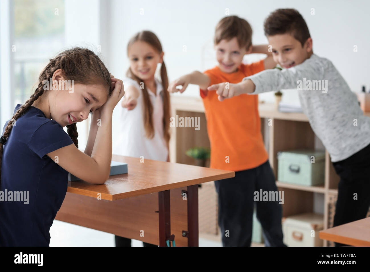 Children bullying their classmate in school Stock Photo - Alamy