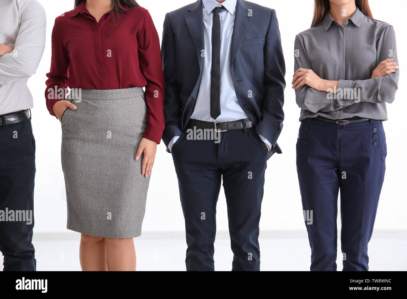 People standing together on light background. Unity concept Stock Photo ...