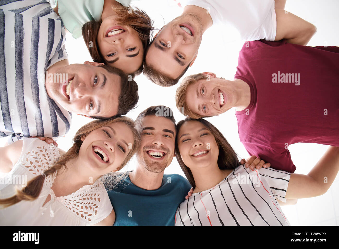 People standing together, view from below. Unity concept Stock Photo ...