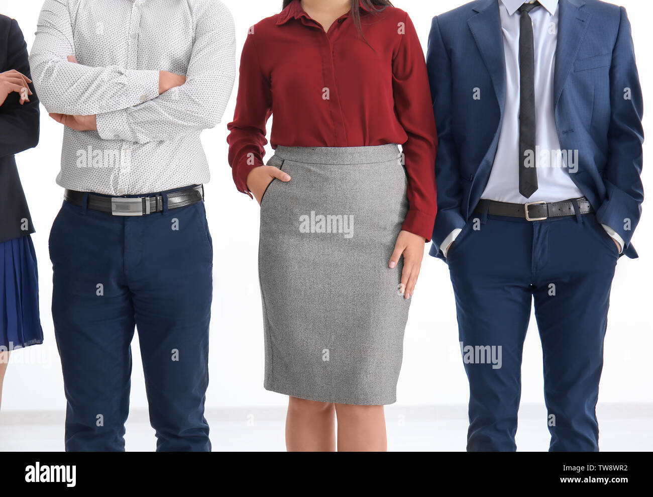 People standing together on light background. Unity concept Stock Photo ...