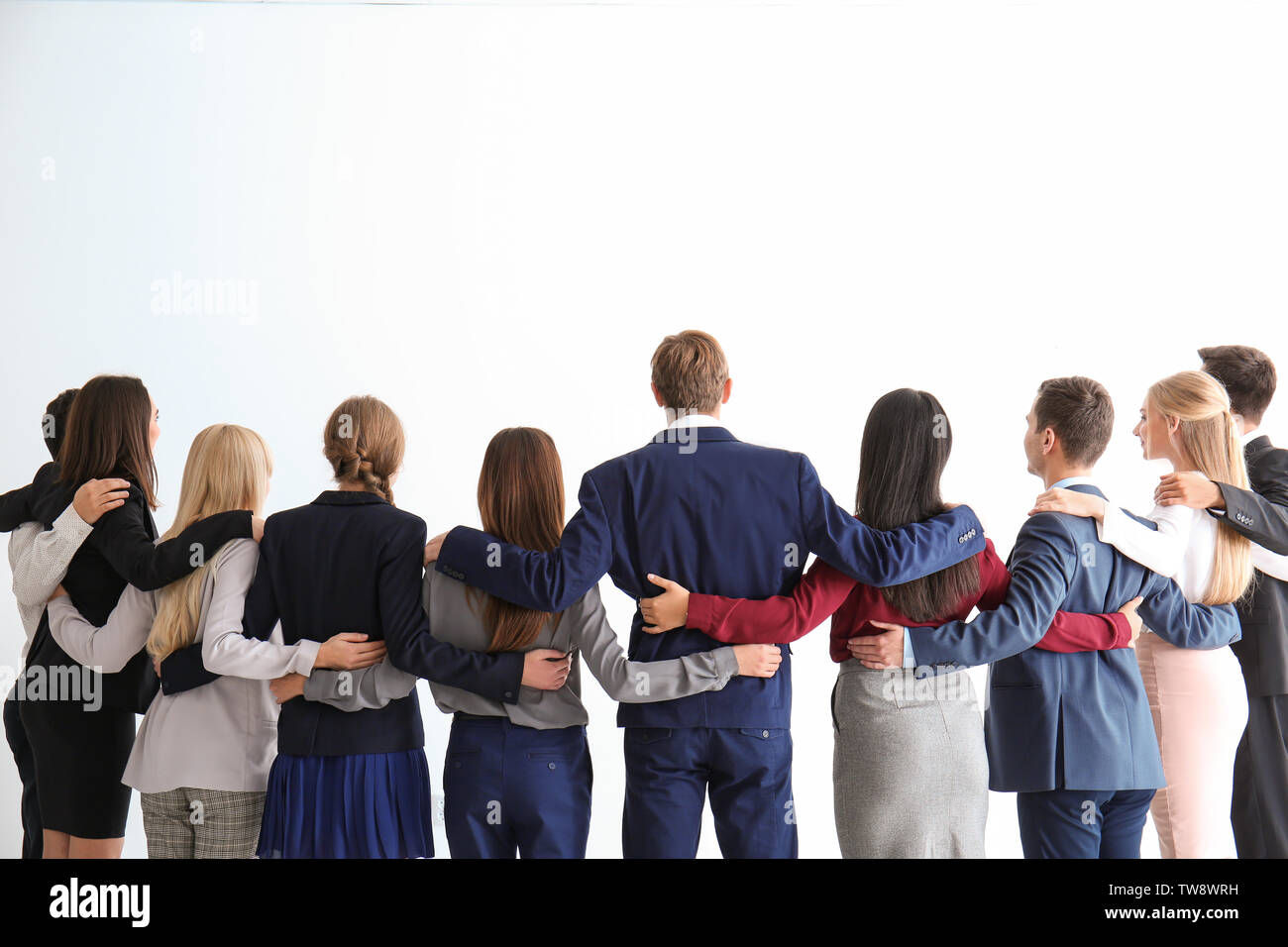 People standing together against white background. Unity concept Stock ...