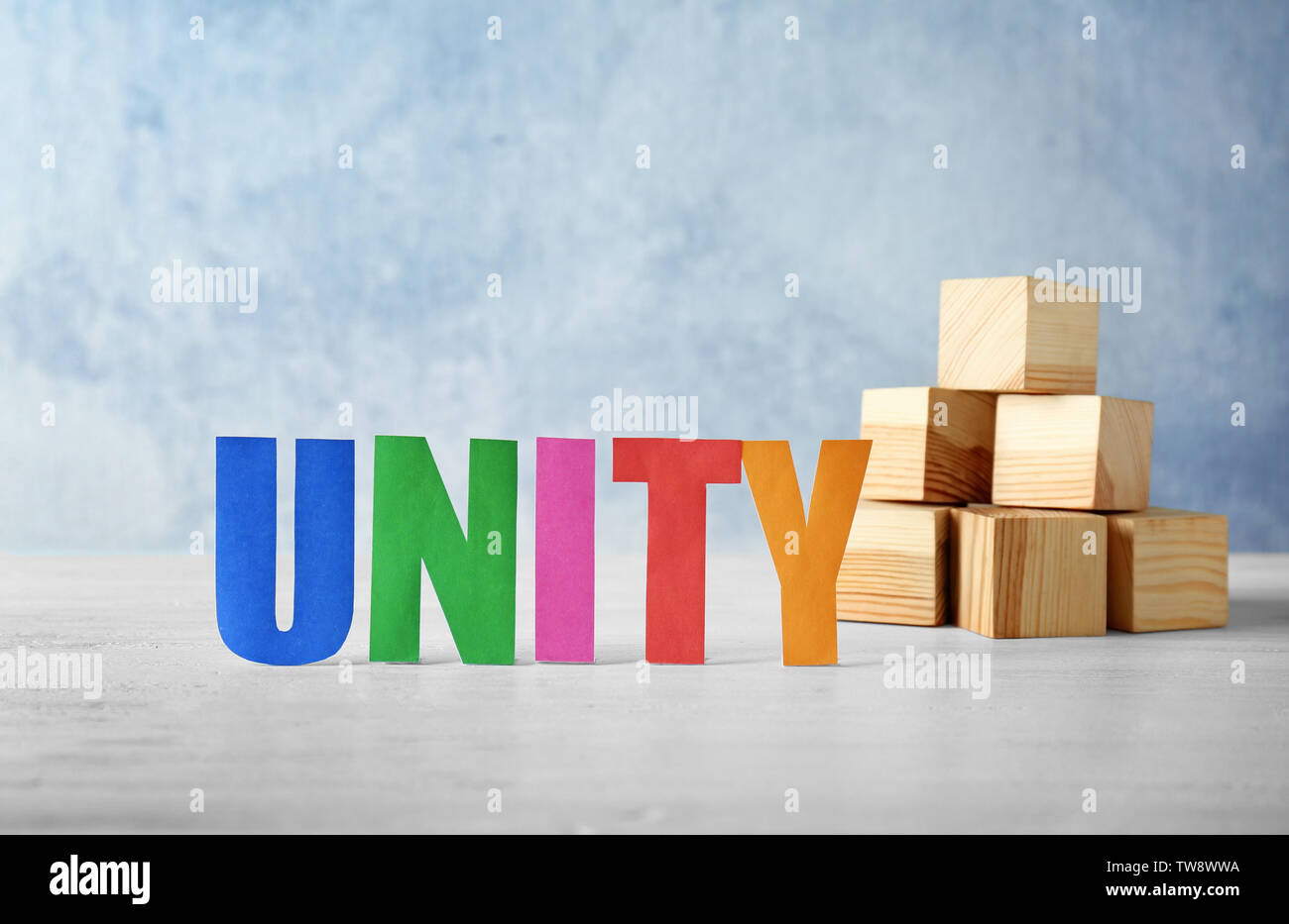 Word UNITY made of paper letters on light background Stock Photo - Alamy