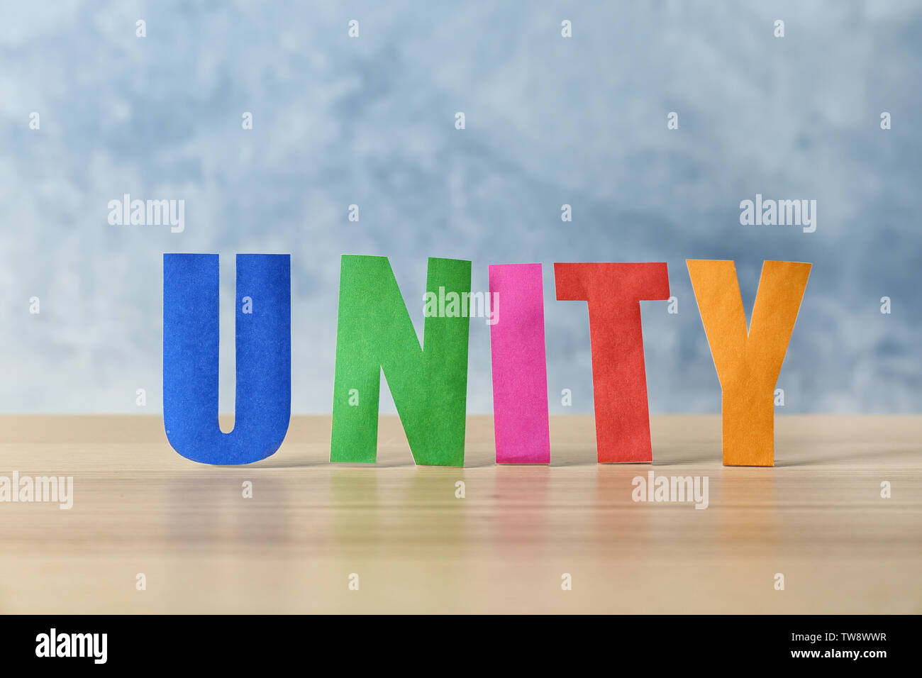 Word UNITY made of paper letters on light background Stock Photo - Alamy
