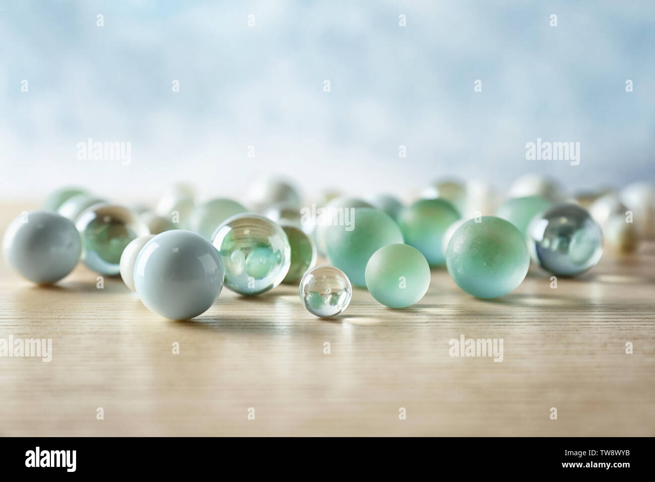 Glass balls on light background. Unity concept Stock Photo - Alamy