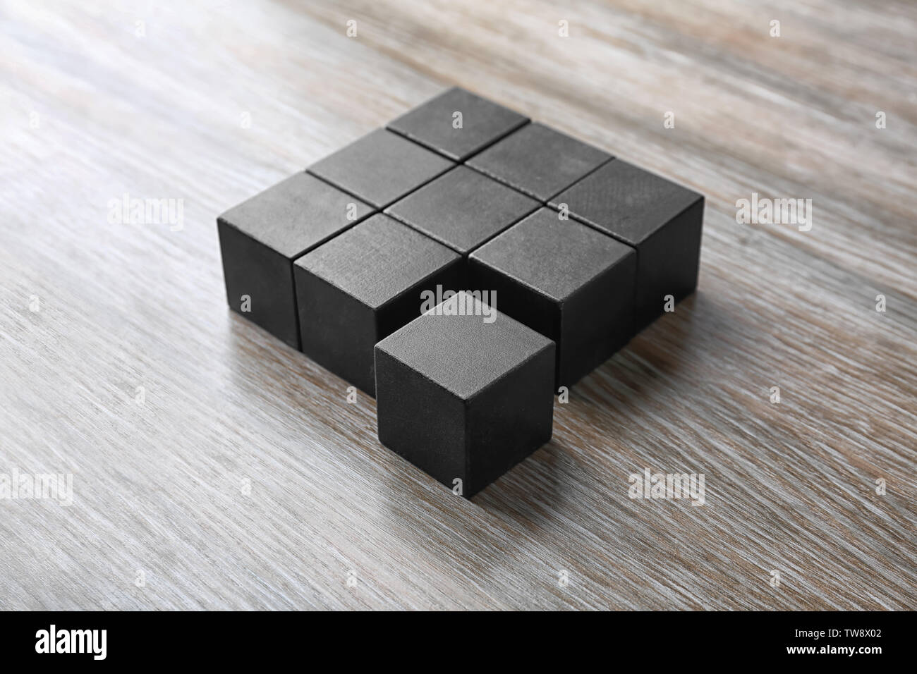 Wooden cubes on table. Unity concept Stock Photo - Alamy