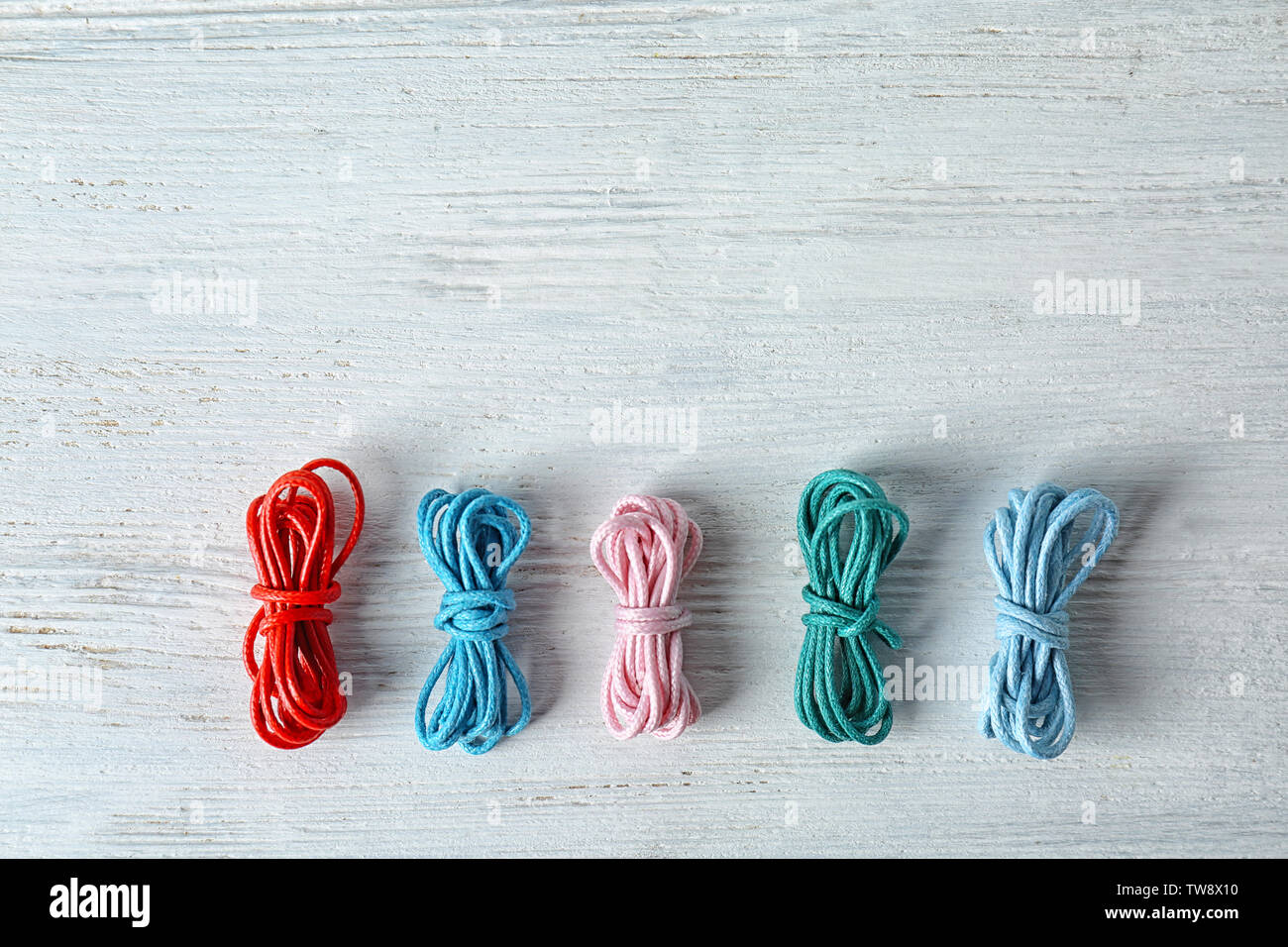 Color strings on light background. Unity concept Stock Photo - Alamy