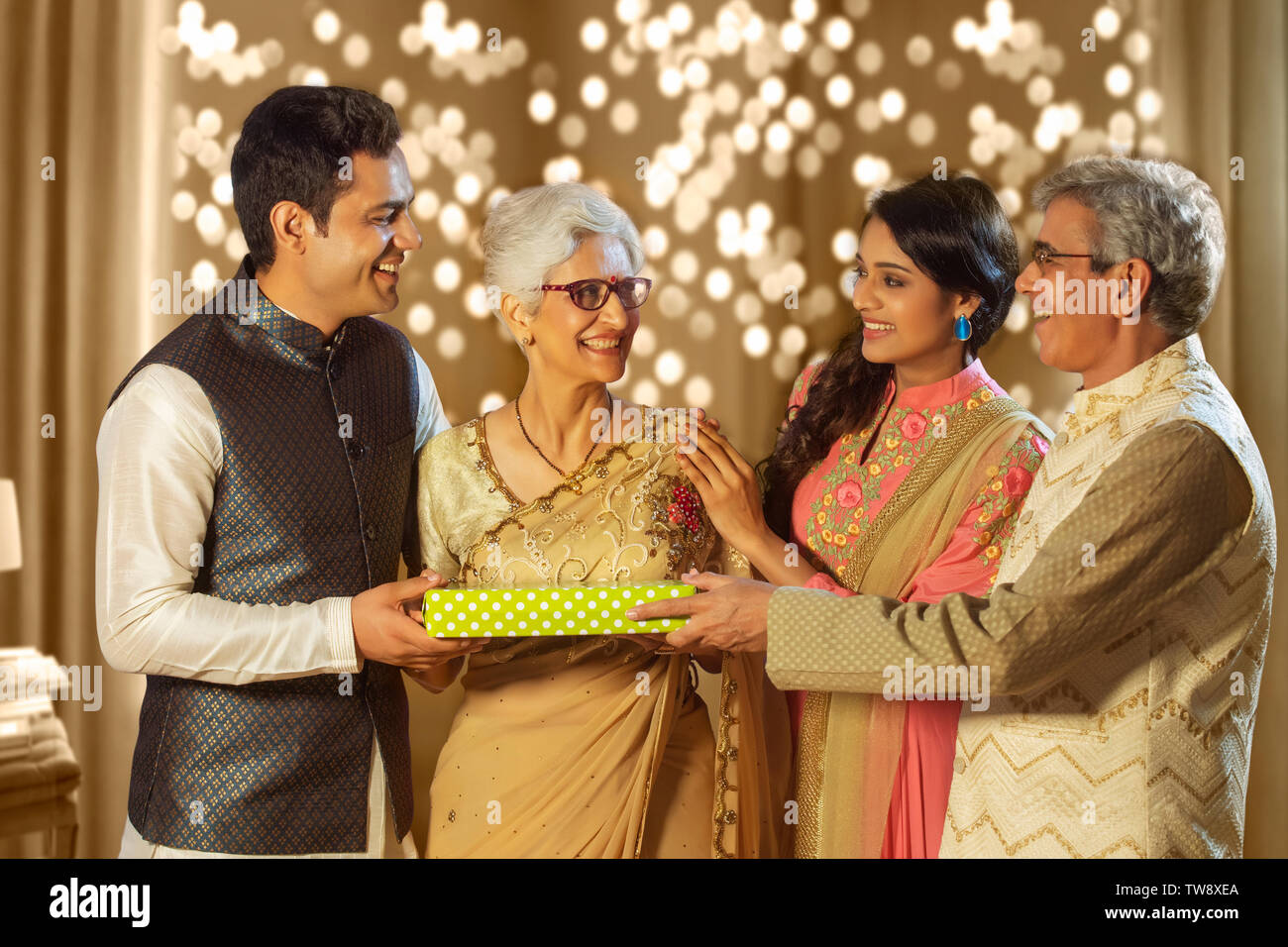 Happy Family Exchanging Gifts on the occasion of Diwali festival Stock ...