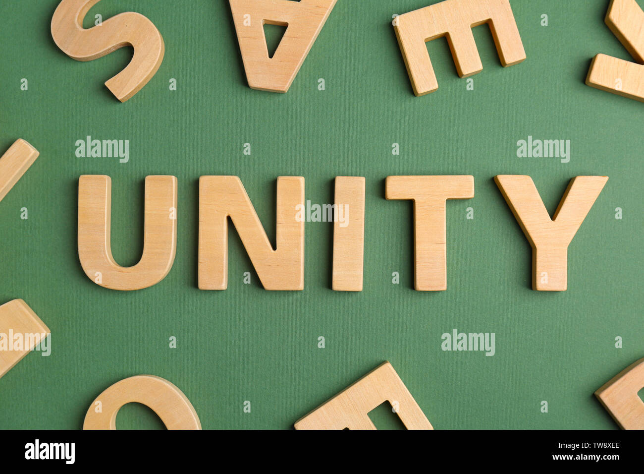 Word UNITY made of letters on color background Stock Photo - Alamy