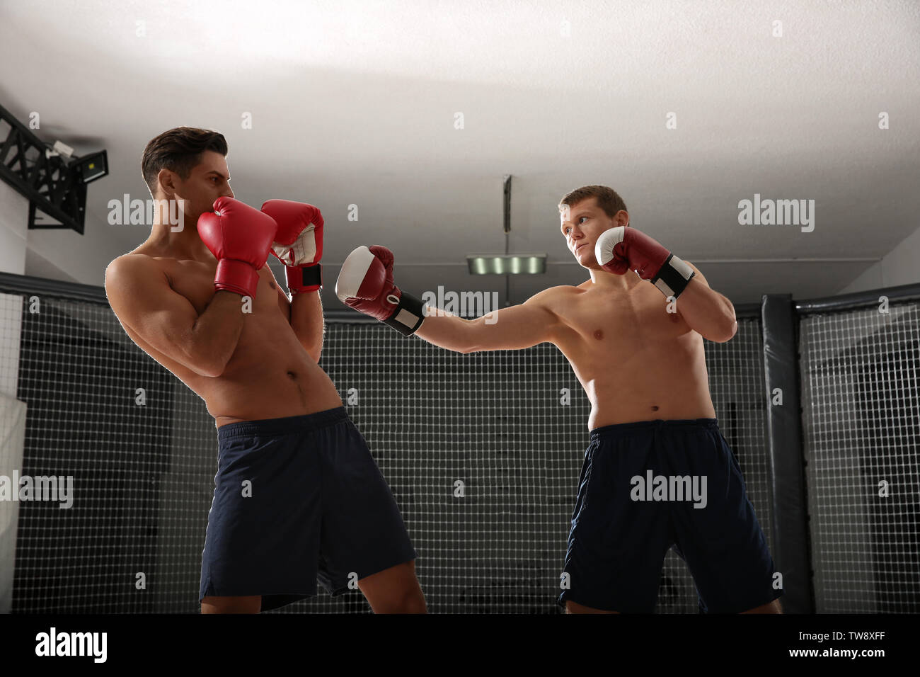 Two boxers fighting arena hi-res stock photography and images - Alamy