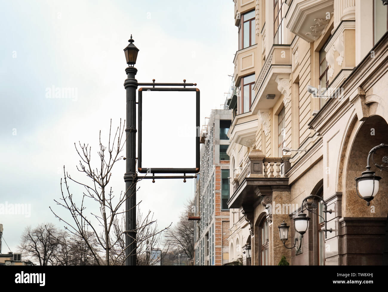 Empty advertising board on city street Stock Photo - Alamy