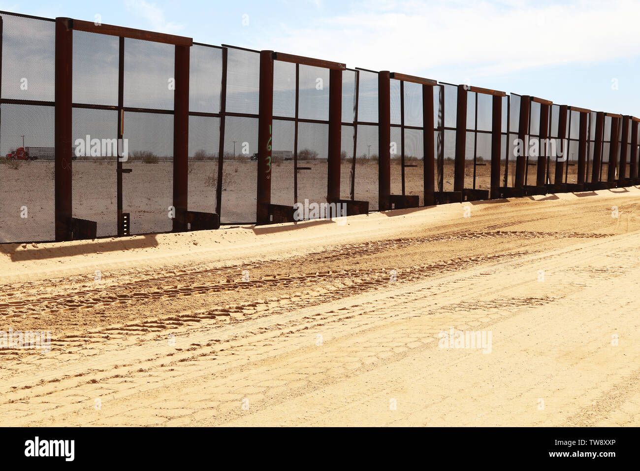 Dilapidated and outdated steel mesh border barrier along the Yuma ...