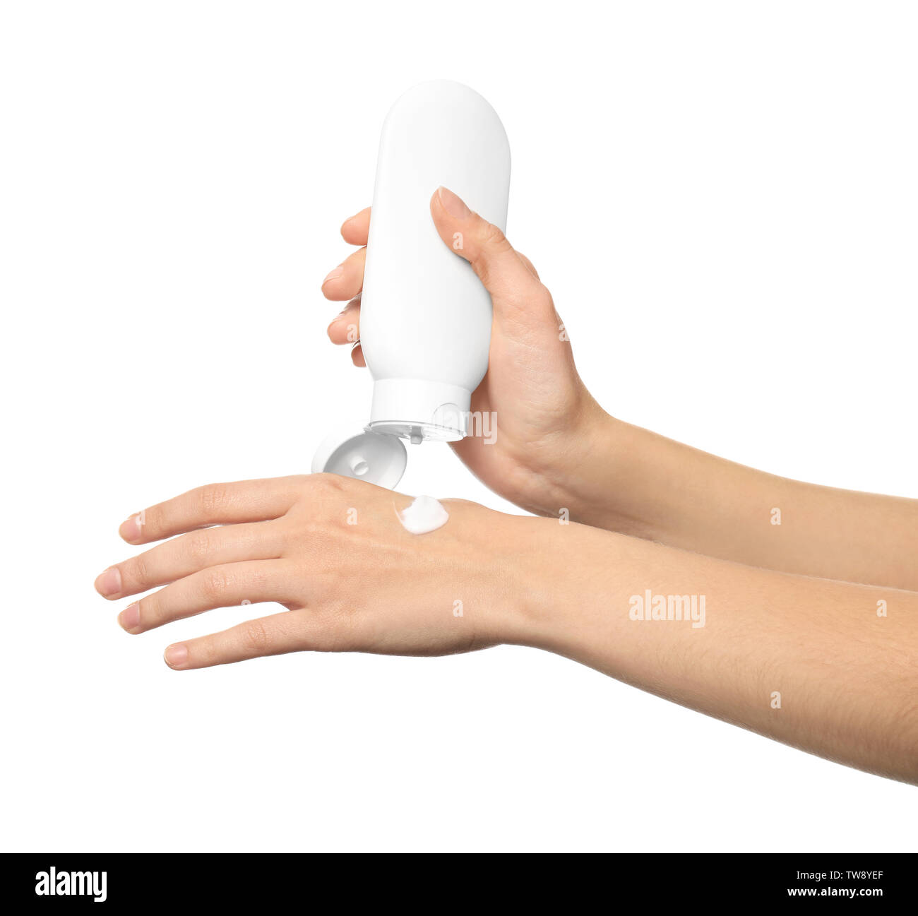 Young woman applying hand cream, on white background Stock Photo - Alamy