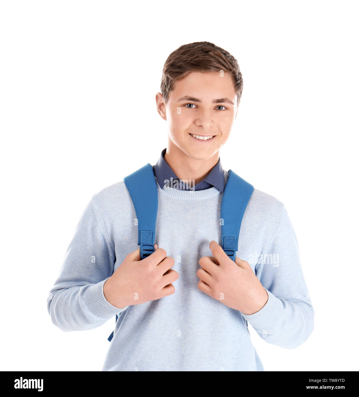 Stylish teenager with backpack against white background Stock Photo - Alamy