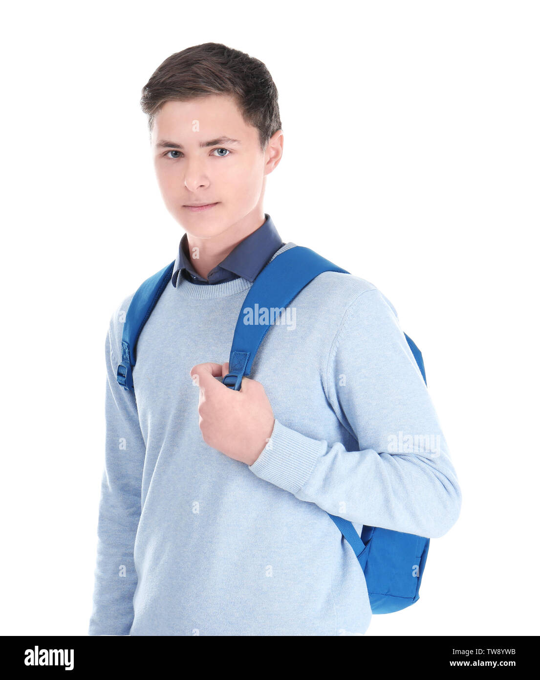 Stylish teenager with backpack against white background Stock Photo - Alamy