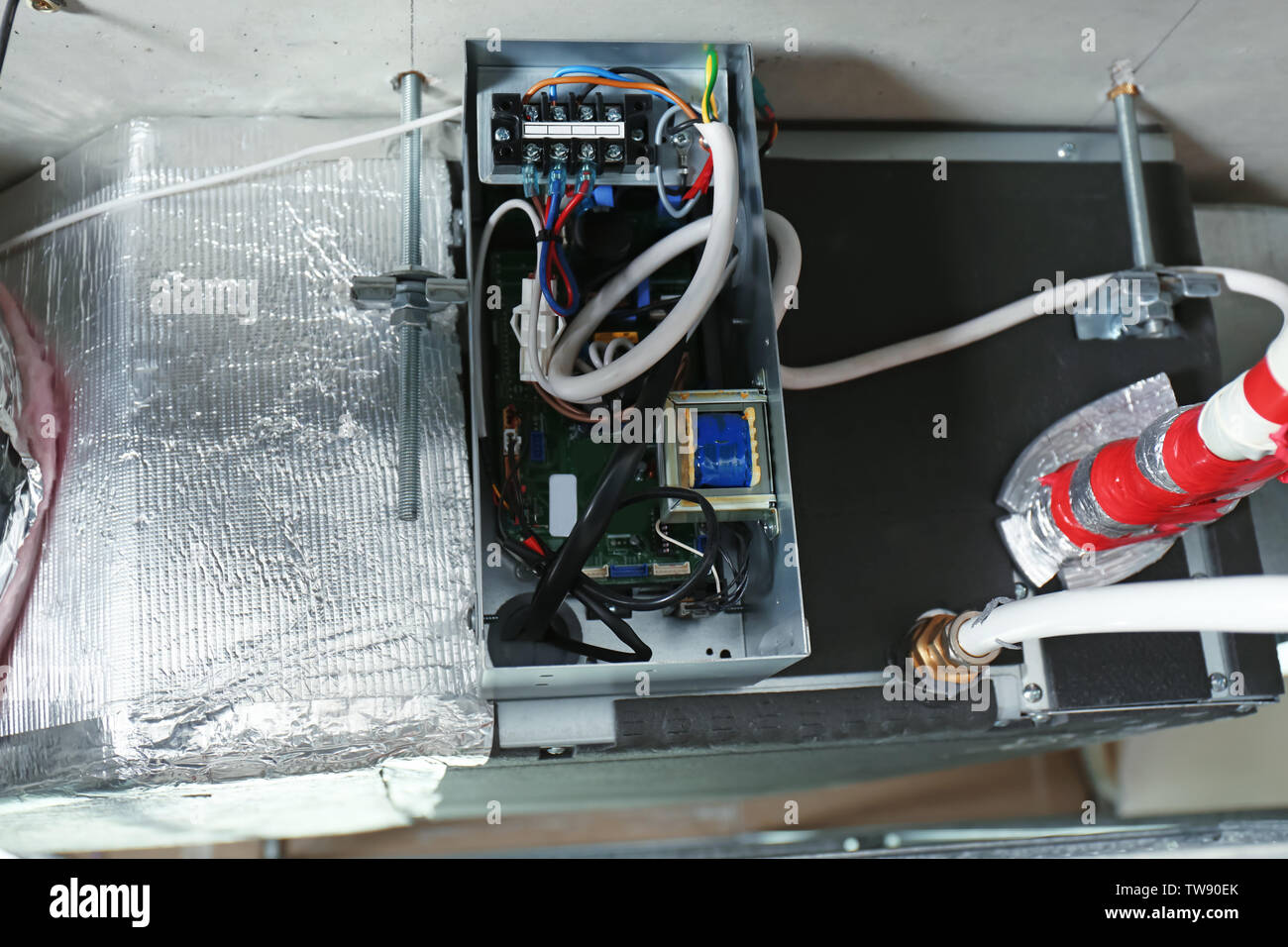 Industrial air conditioner with power unit indoors Stock Photo - Alamy