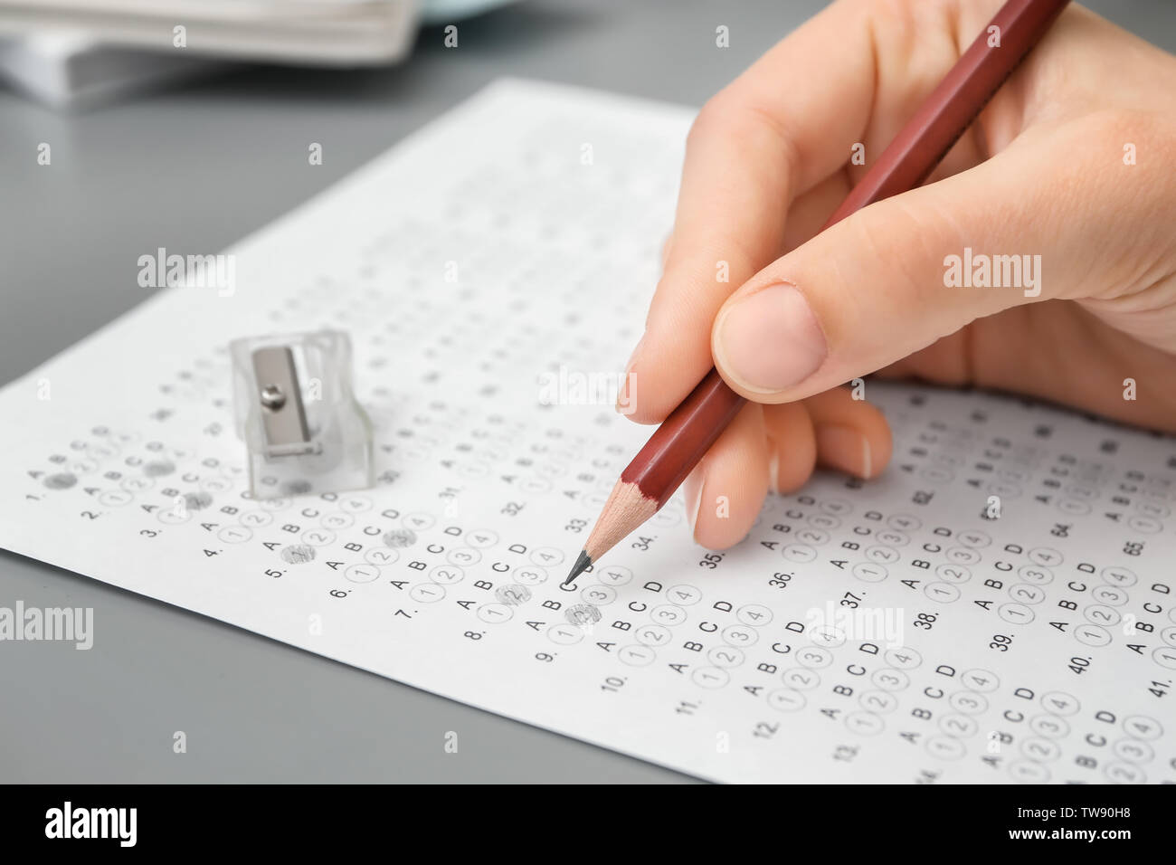 Male student passing exam, closeup Stock Photo - Alamy