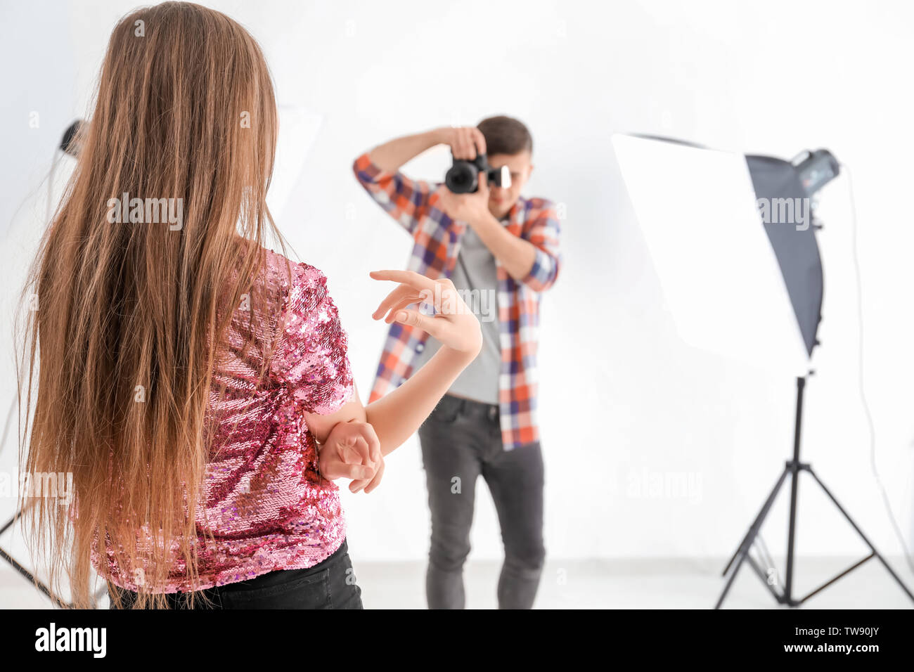 Young beautiful woman posing photographer hi-res stock photography and ...